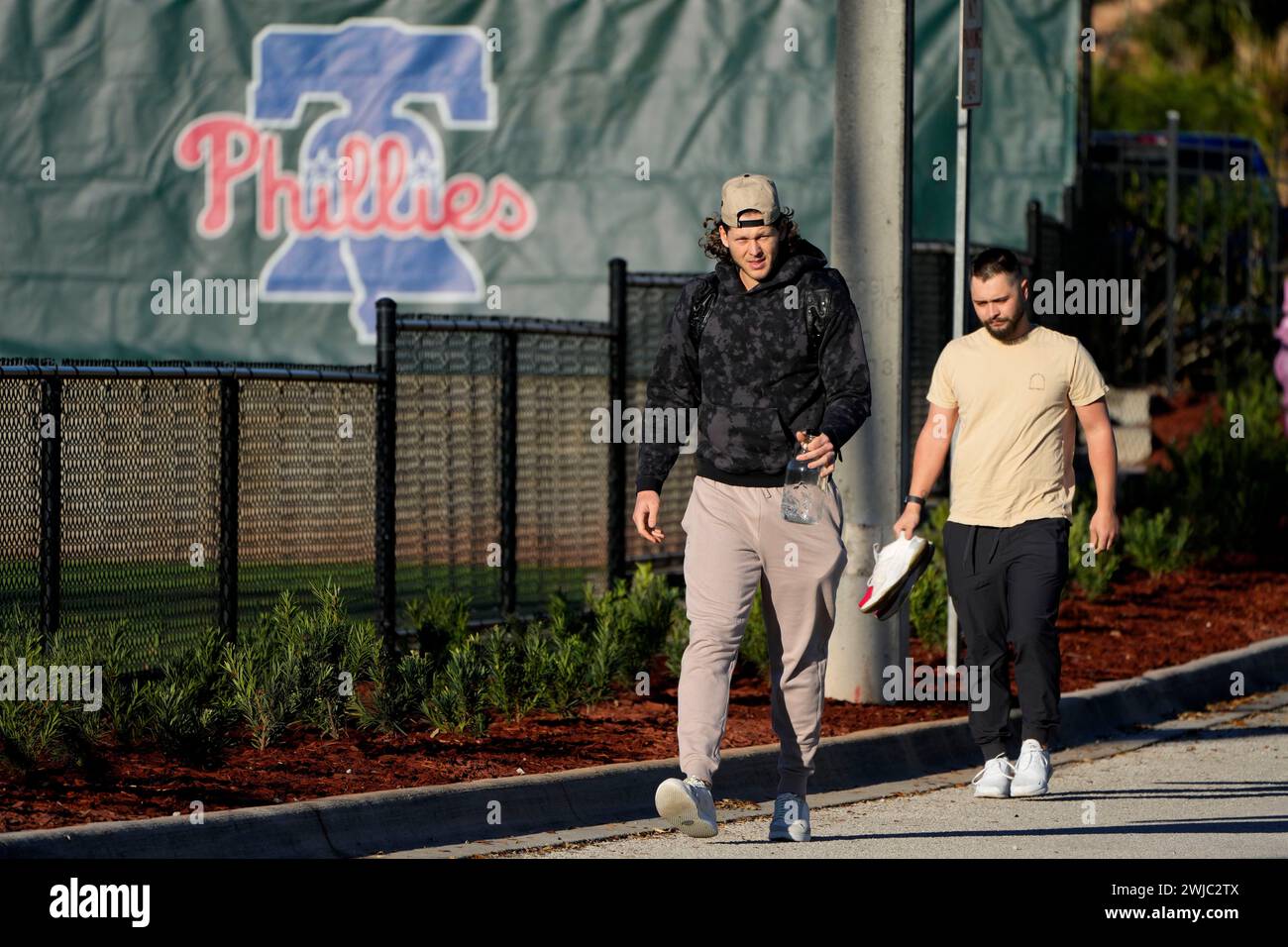 Philadelphia Phillies first baseman Alec Bohm, left, arrives for a ...