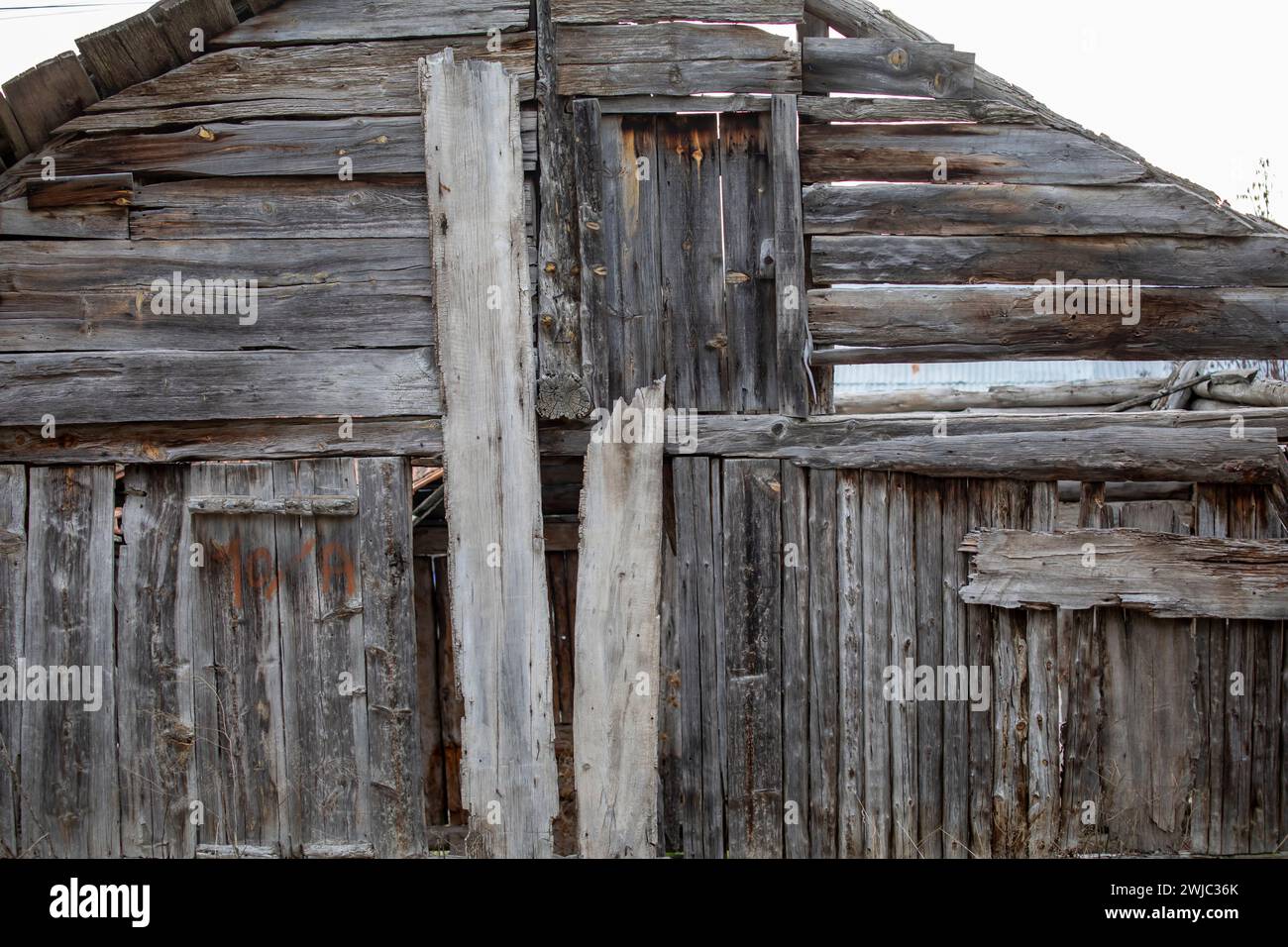 Dark grunge wooden ruin house and wallpaper or background Stock Photo ...