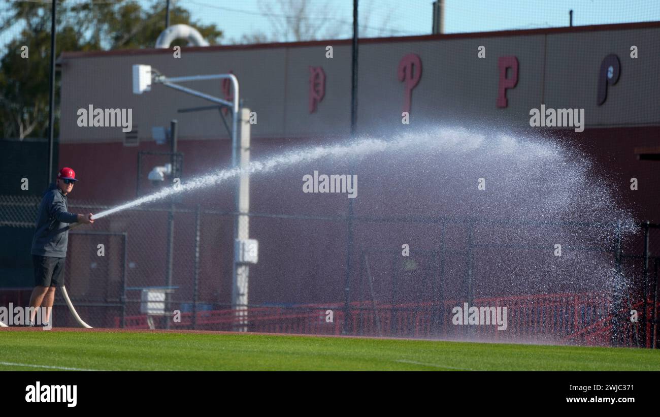 A grounds crew worker prepares a field before a Philadelphia Phillies ...