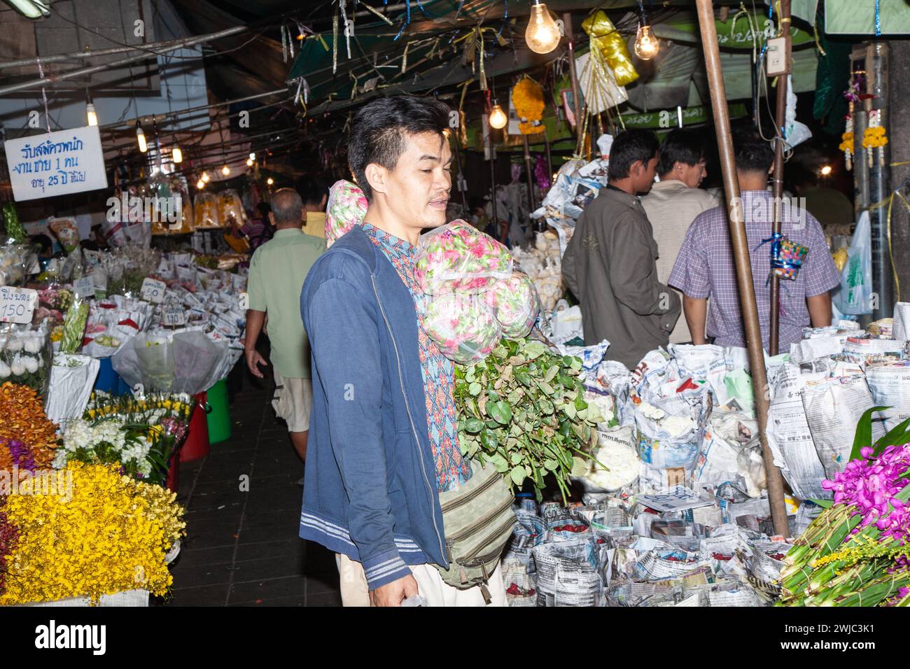 Bangkok, Thailand - December 22, 2009: fresh red roses are offered ...