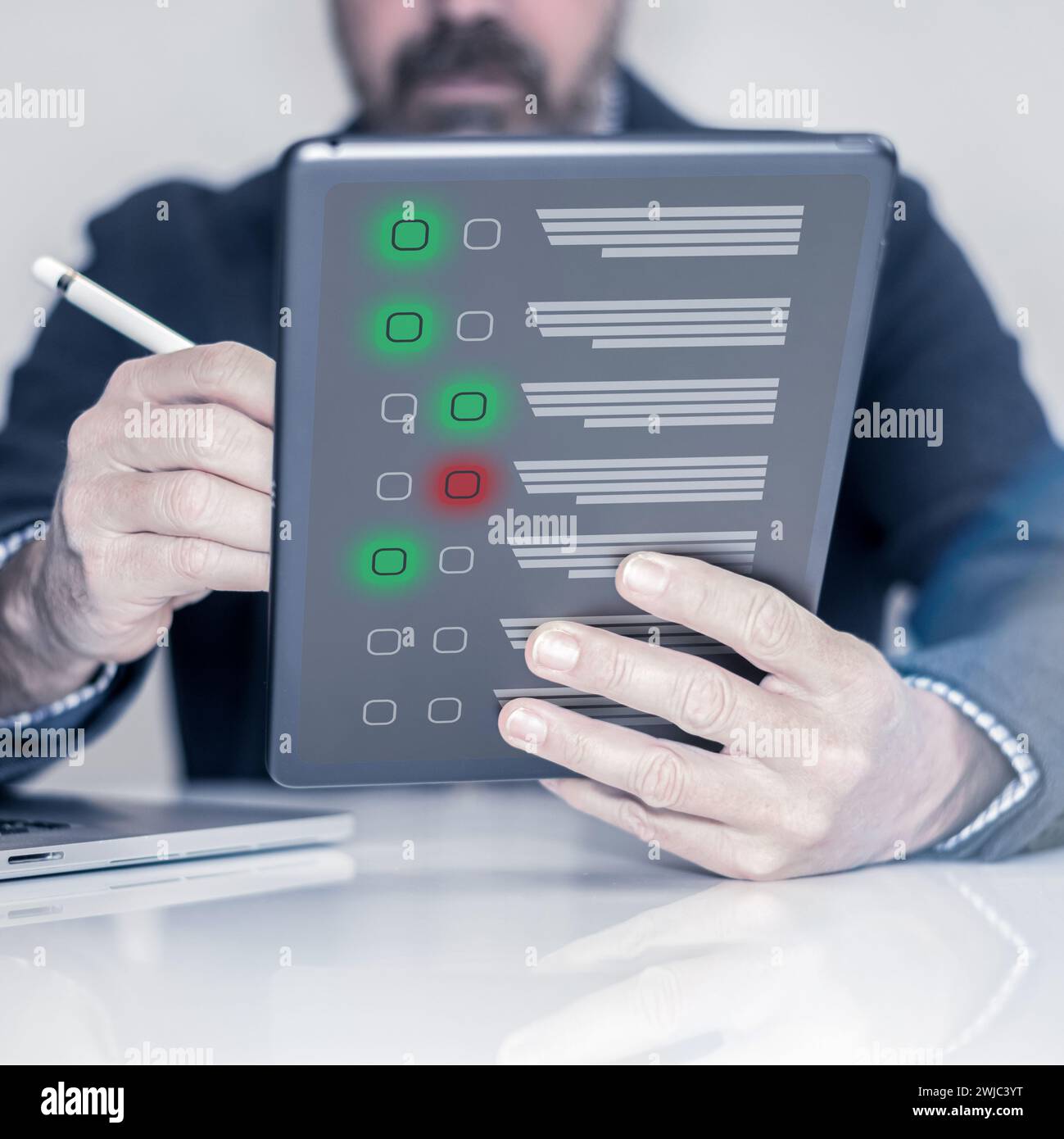 Man do online exam on virtual screen. Answer a survey filling out a ...
