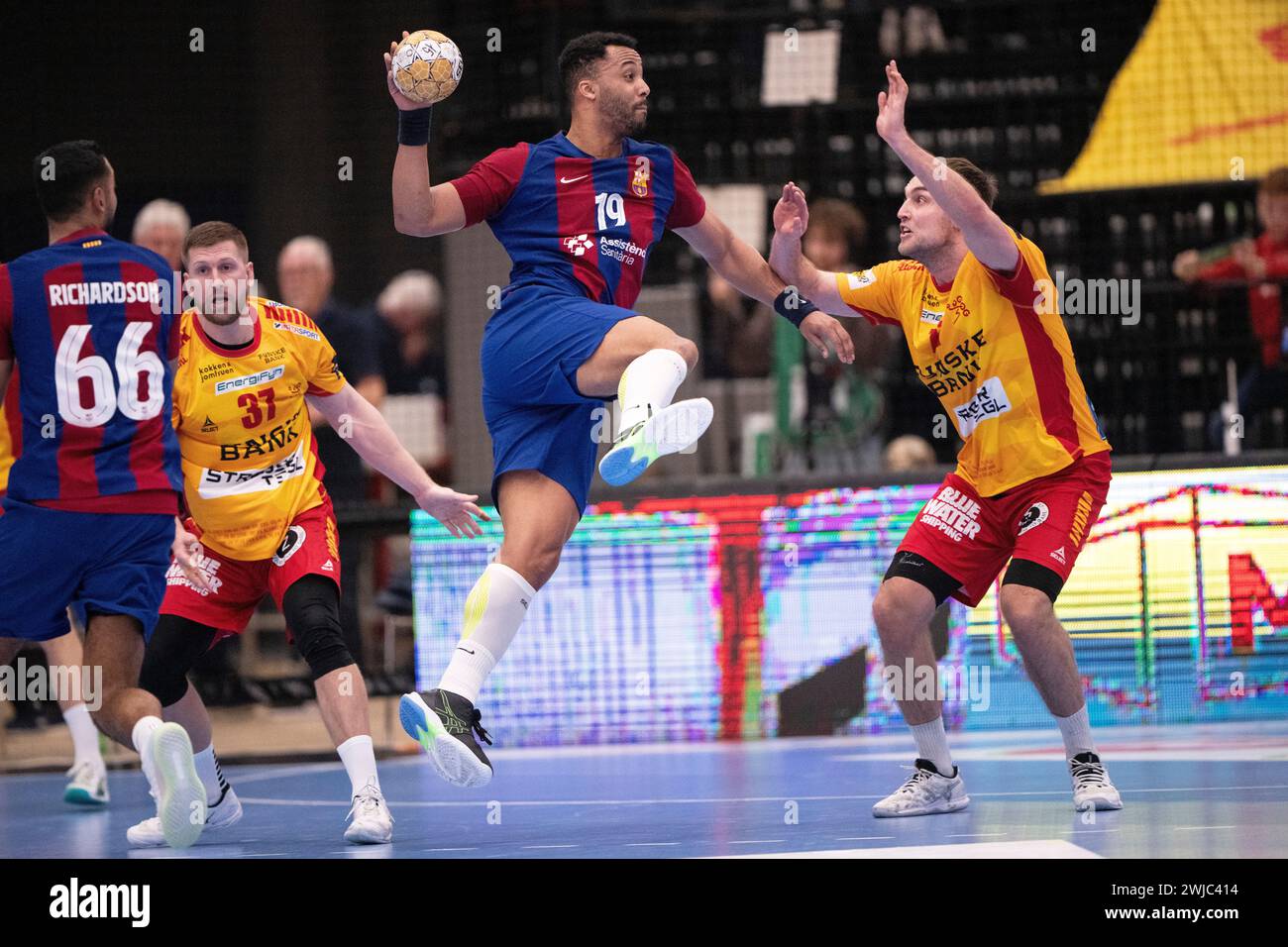 Barcelona's Timothey N'Guessan against GOG's Frederik Clausen and Linus ...