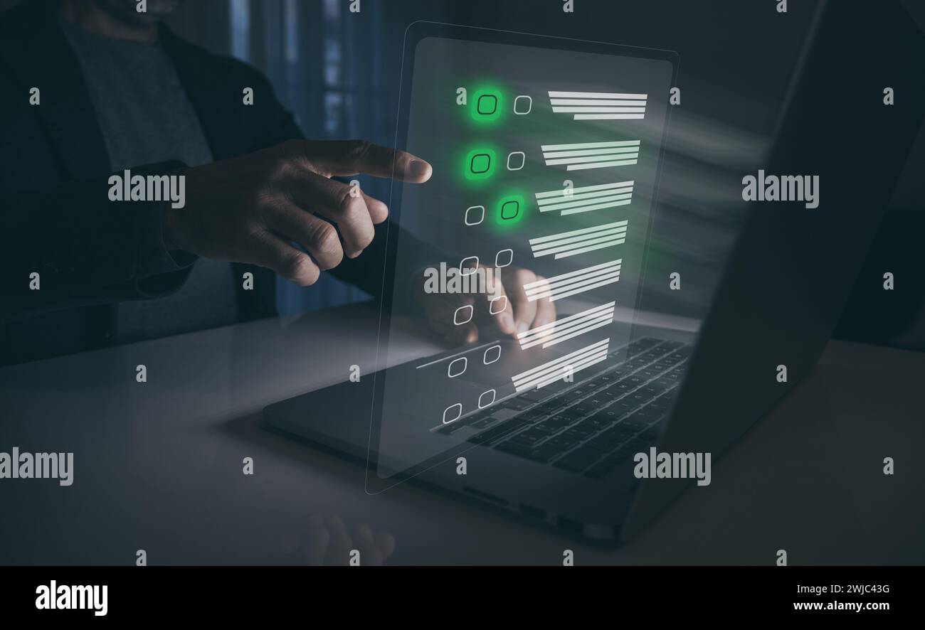 Man do online exam on virtual screen. Answer a survey filling out a ...