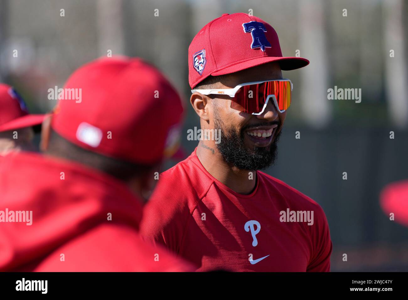 Philadelphia Phillies pitcher Cristopher Sanchez talks with teammates ...