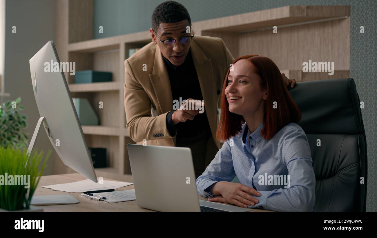 Annoyed African American businessman argue with Caucasian businesswoman ...