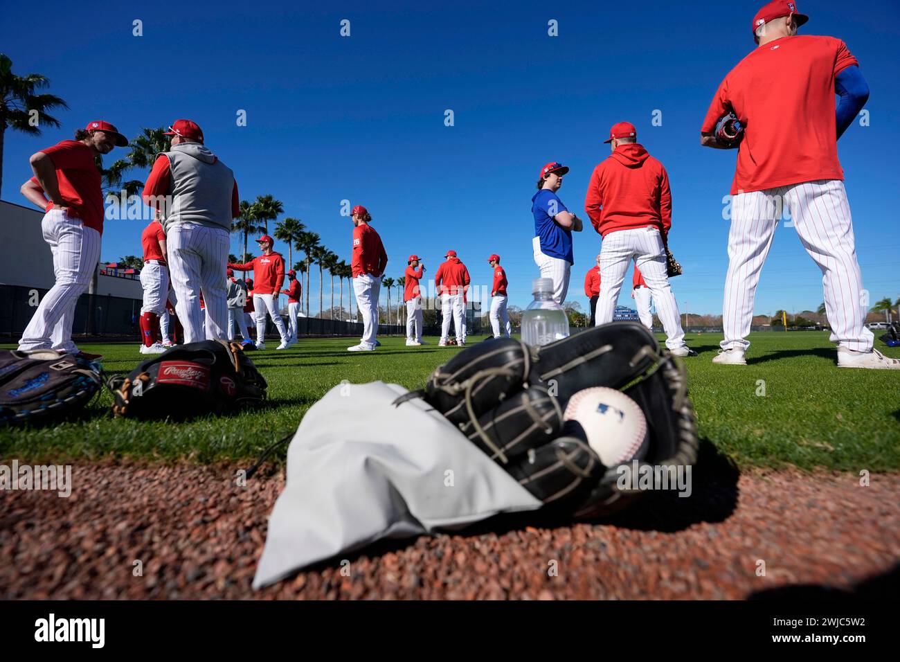 Philadelphia Phillies players stand in the outfield during a baseball ...