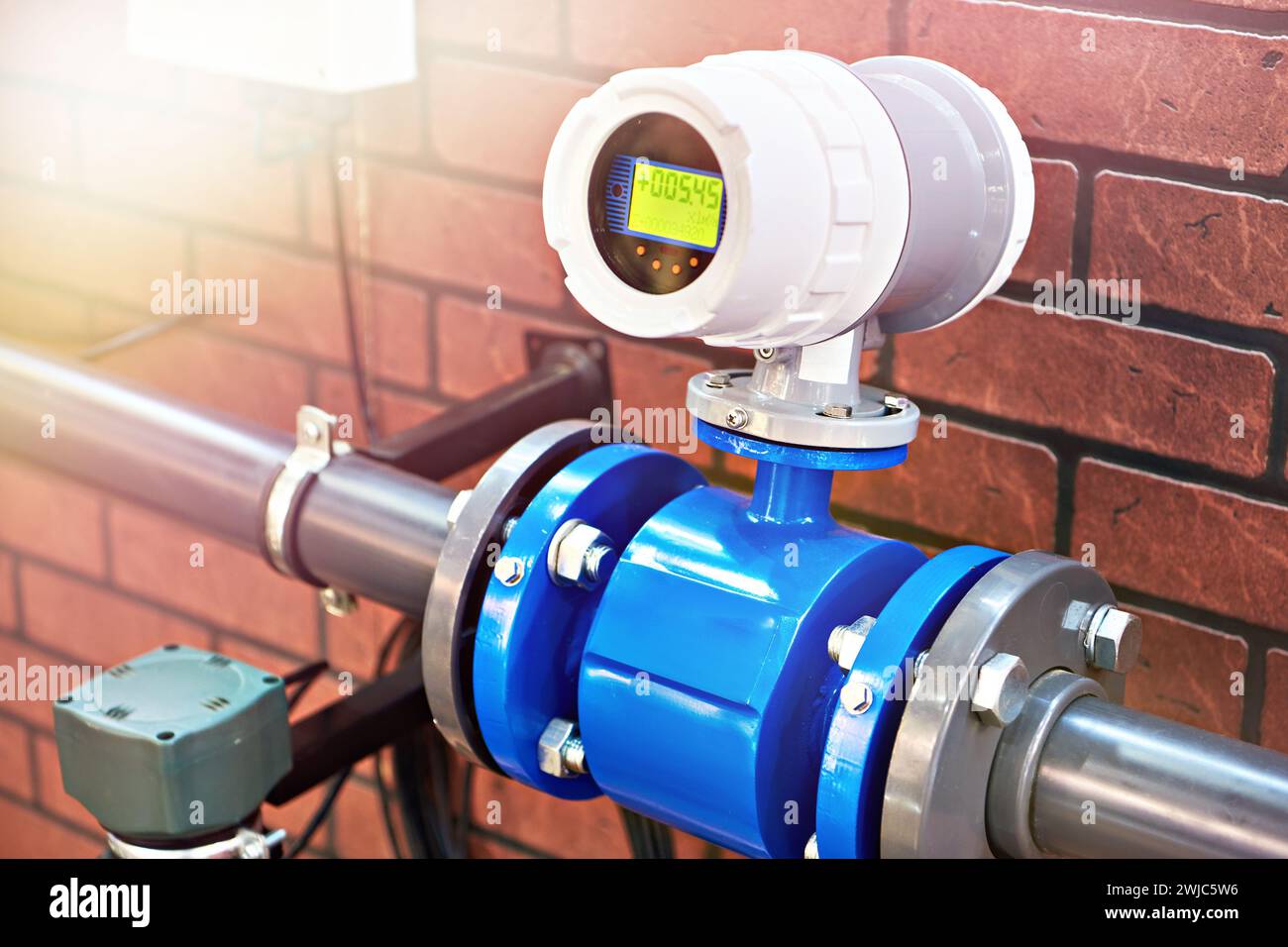 Electromagnetic flowmeter detector and water pipeline Stock Photo - Alamy