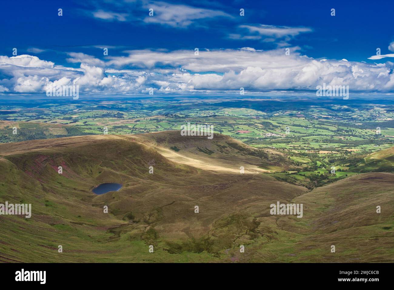 A stunning aerial view of lush green countryside, as seen from the top ...