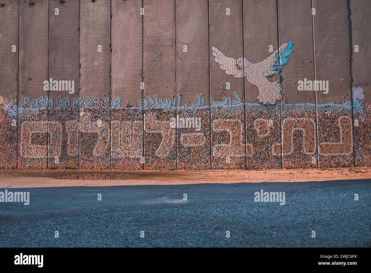The 'Path to Peace' mosaic, adorned with messages of hope and a dove of ...