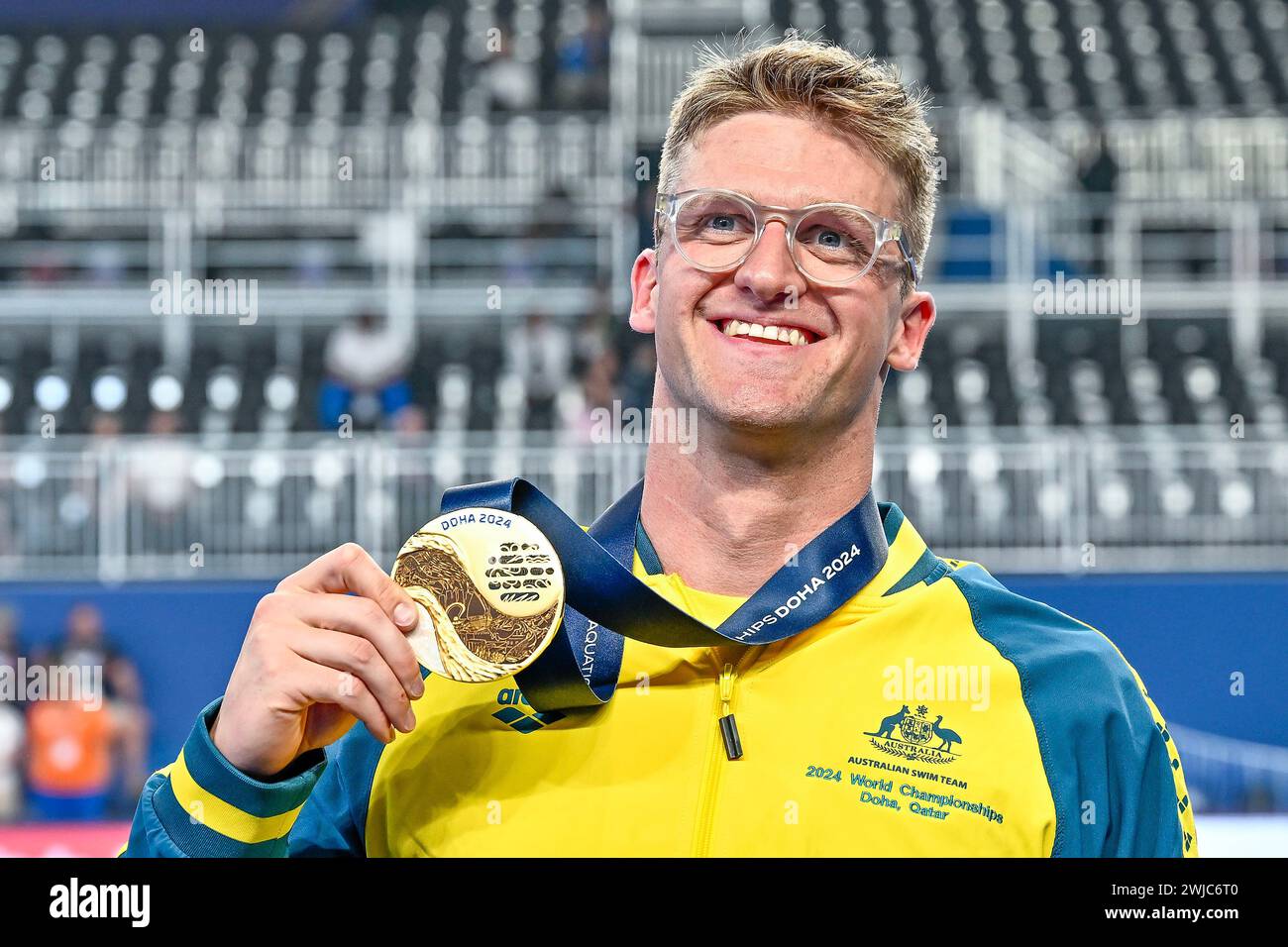Doha, Qatar. 14th Feb, 2024. Sam Williamson of Australia shows the gold medal after competing in ...