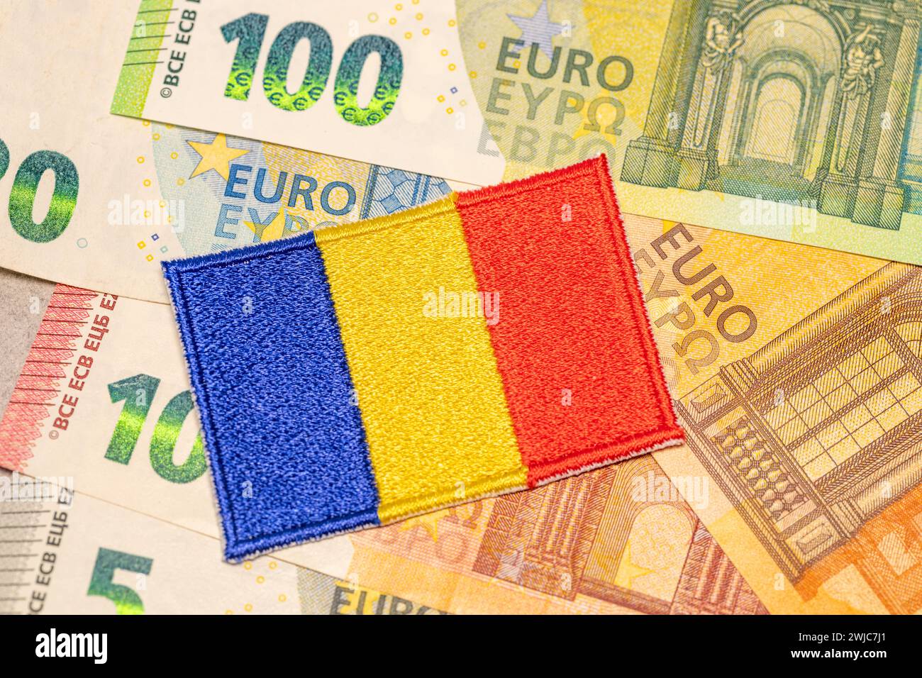 Euro banknotes and Romanian flag Concept, Conversion of Romanian lei to ...