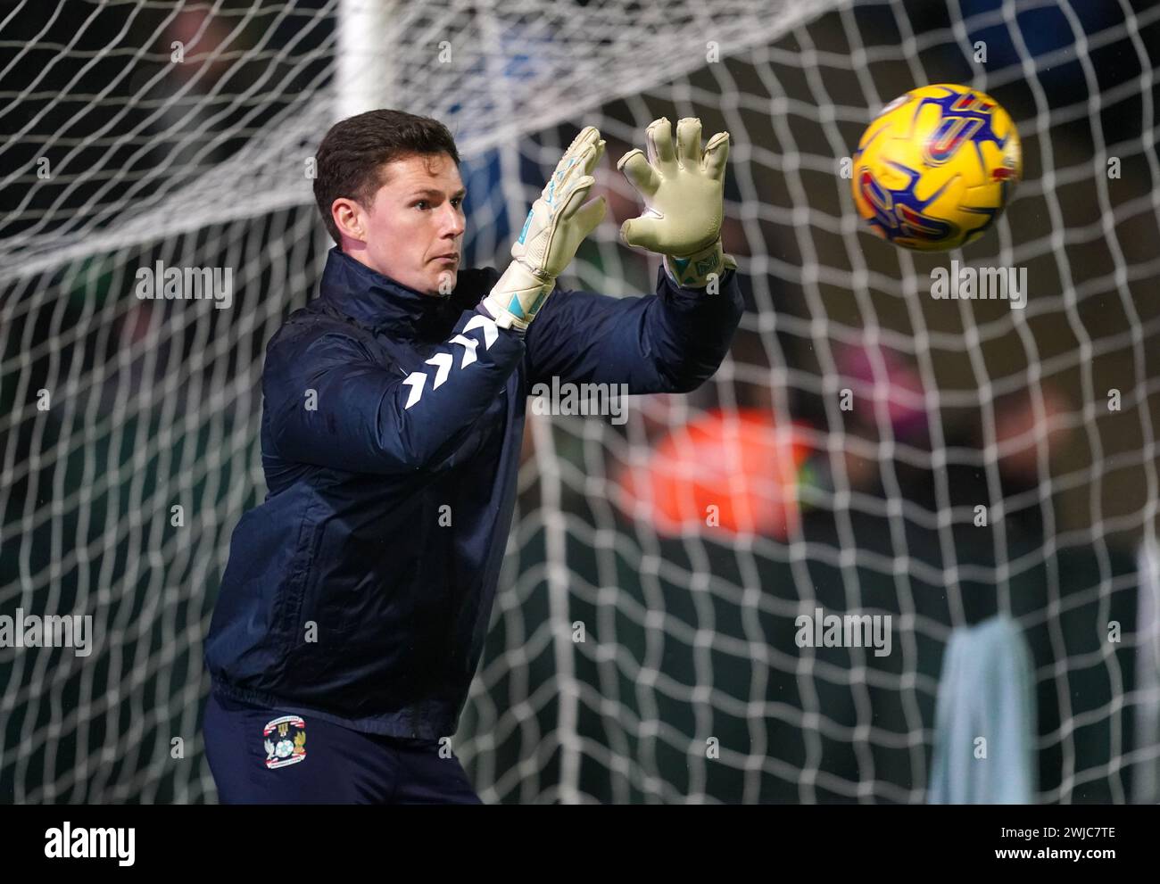 Coventry City goalkeeper Ben Wilson warming up ahead of the Sky Bet ...
