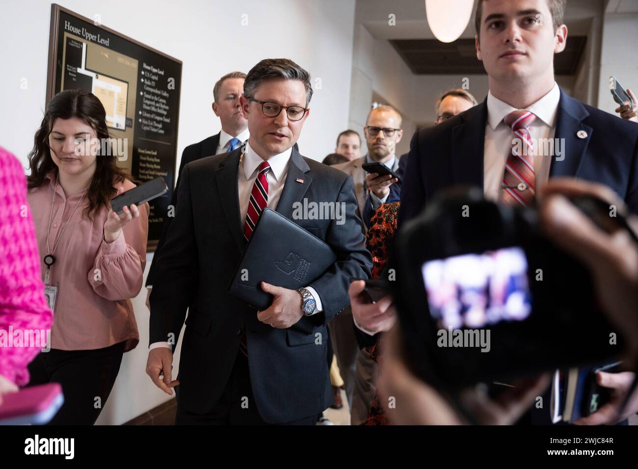 House Speaker Mike Johnson (R-La.) speaks with reporters as he departs ...