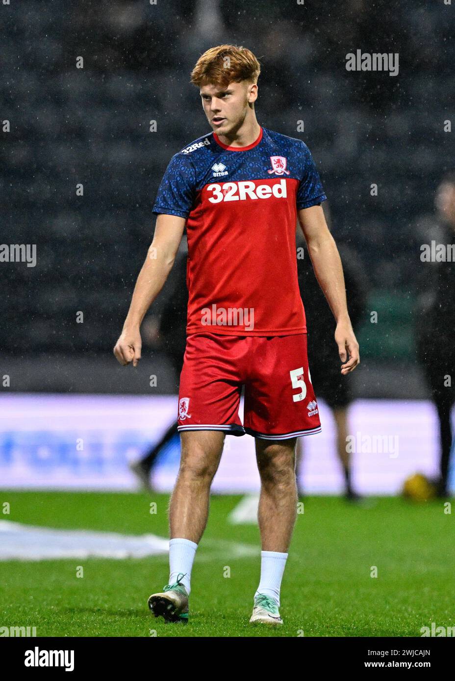Luke Woolston warms up ahead of the match, during the Sky Bet ...