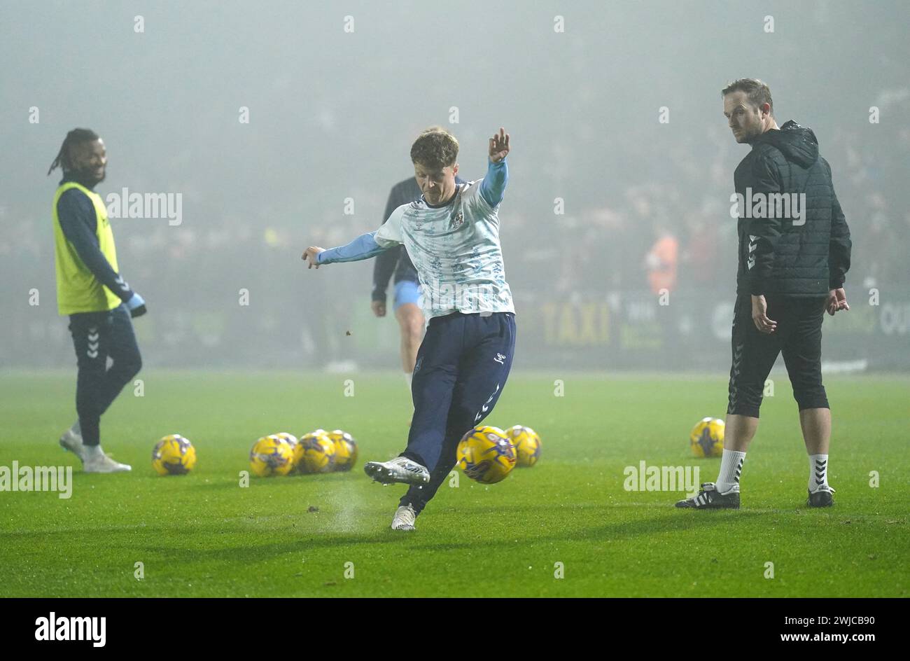 Coventry City's Victor Torp (centre) warming up ahead of the Sky Bet ...