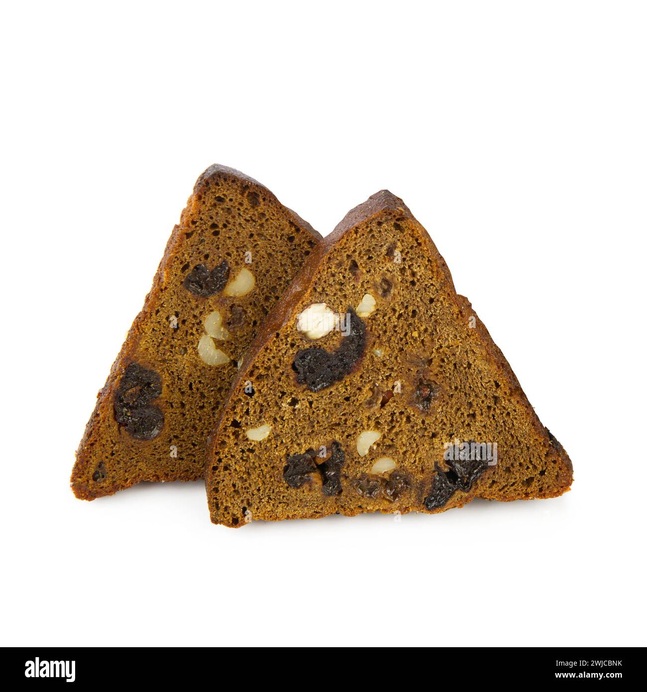 Slices of bread with dried fruits and nuts isolated on a white ...