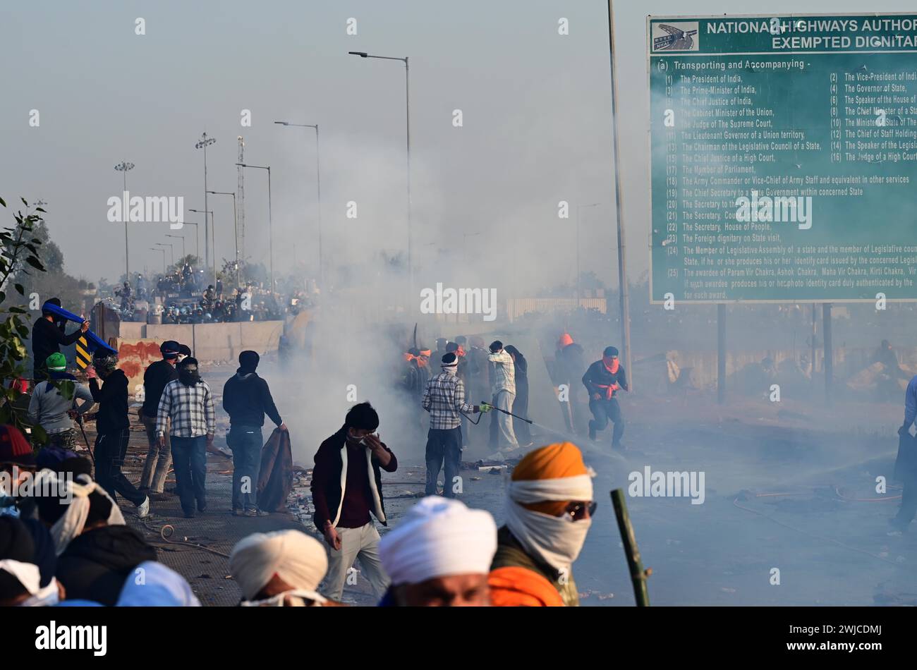 CHANDIGARH, INDIA -FEBRUARY 14: Haryana Police fired Tear gas shells to ...