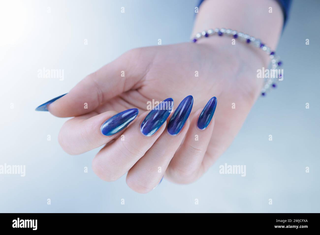 Girl fingers long nails hi-res stock photography and images - Alamy