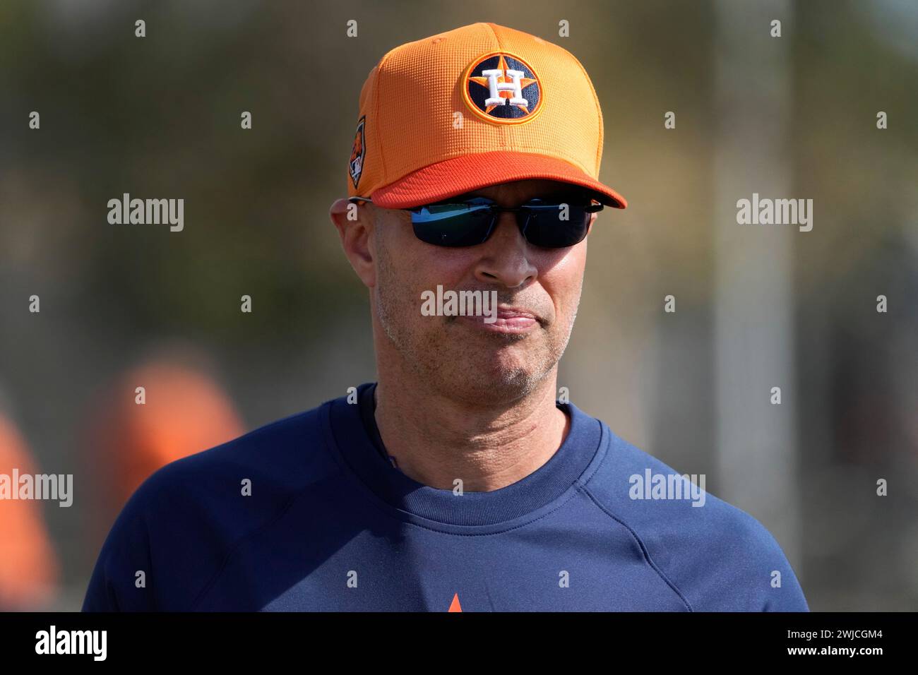 Houston Astros manager Joe Espada roams the practice fields during a ...