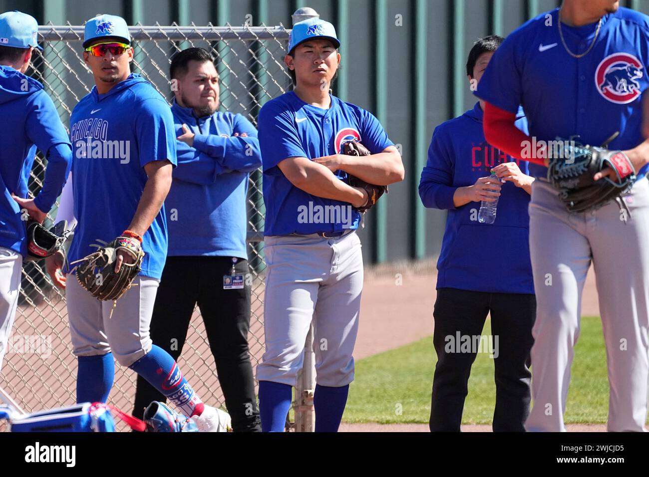 Chicago Cubs pitcher Shota Imanaga watches teammates throw during a MLB ...