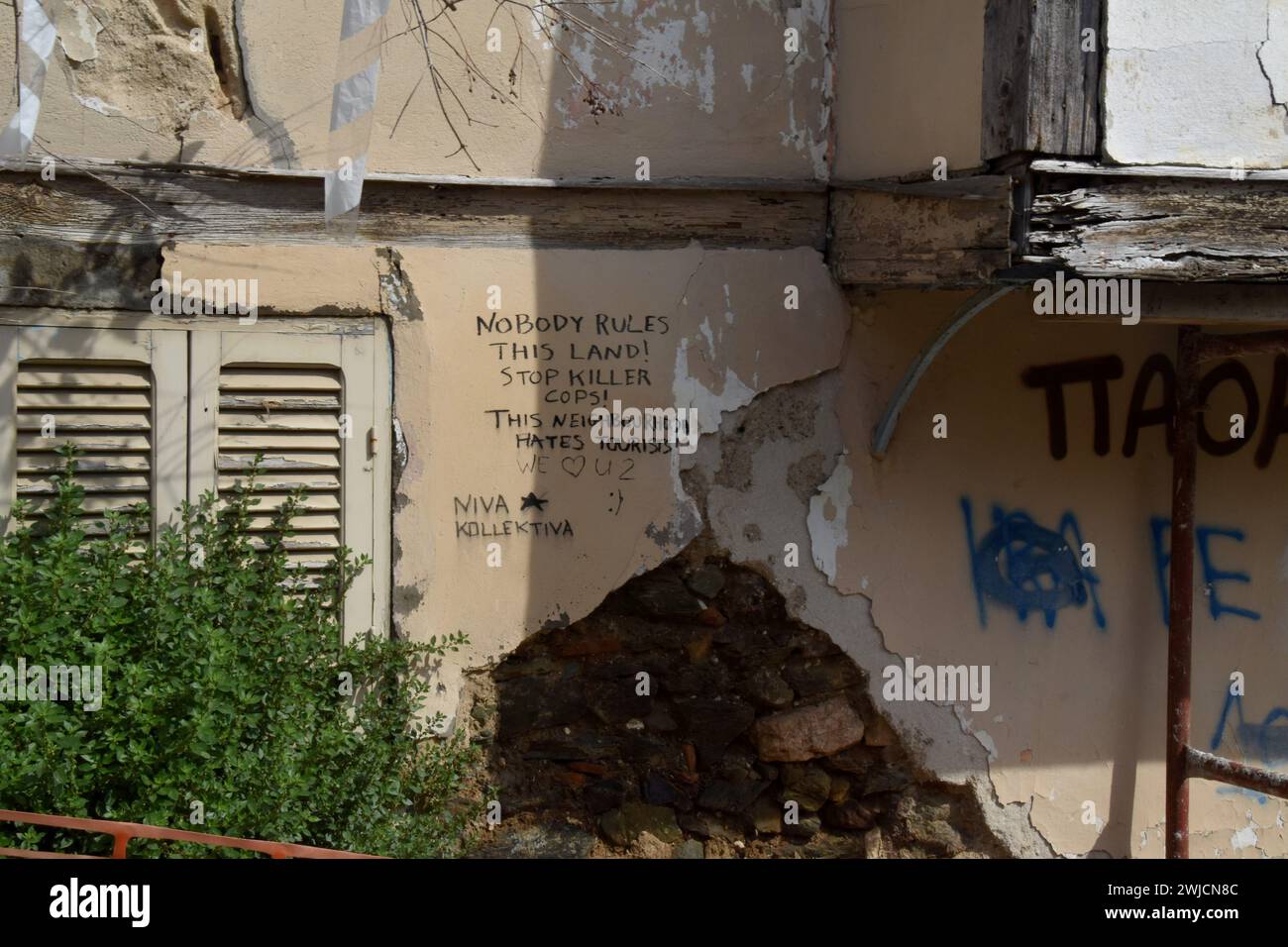 Spray painted English graffiti slogan telling tourists to stay away ...