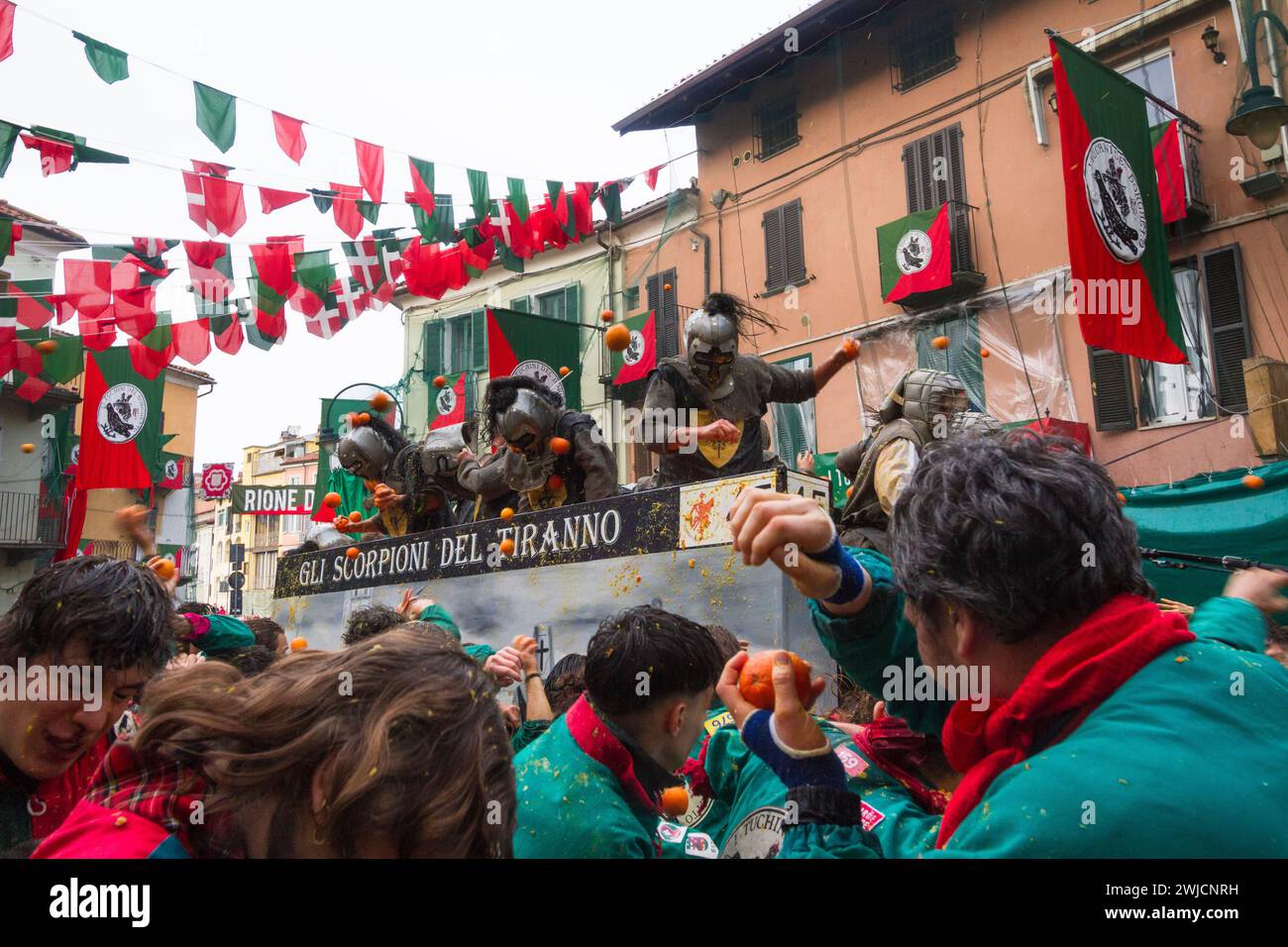 Ivrea, Italy. 12th Feb, 2024. Orange throwers fighting during the ...