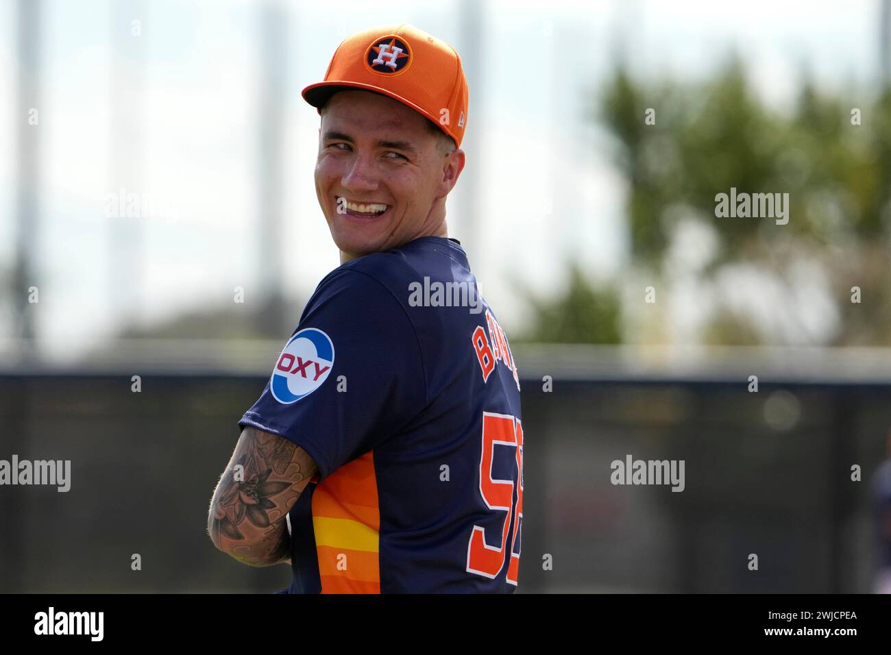 Houston Astros pitcher Hunter Brown smiles during a spring training ...