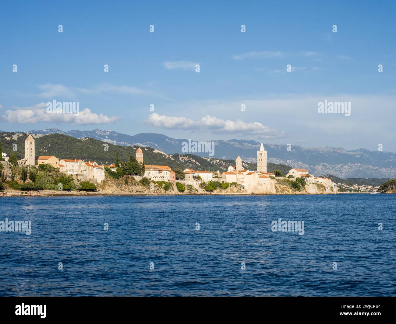 Church towers in the old town centre of Rab, seen from the sea, Rab ...
