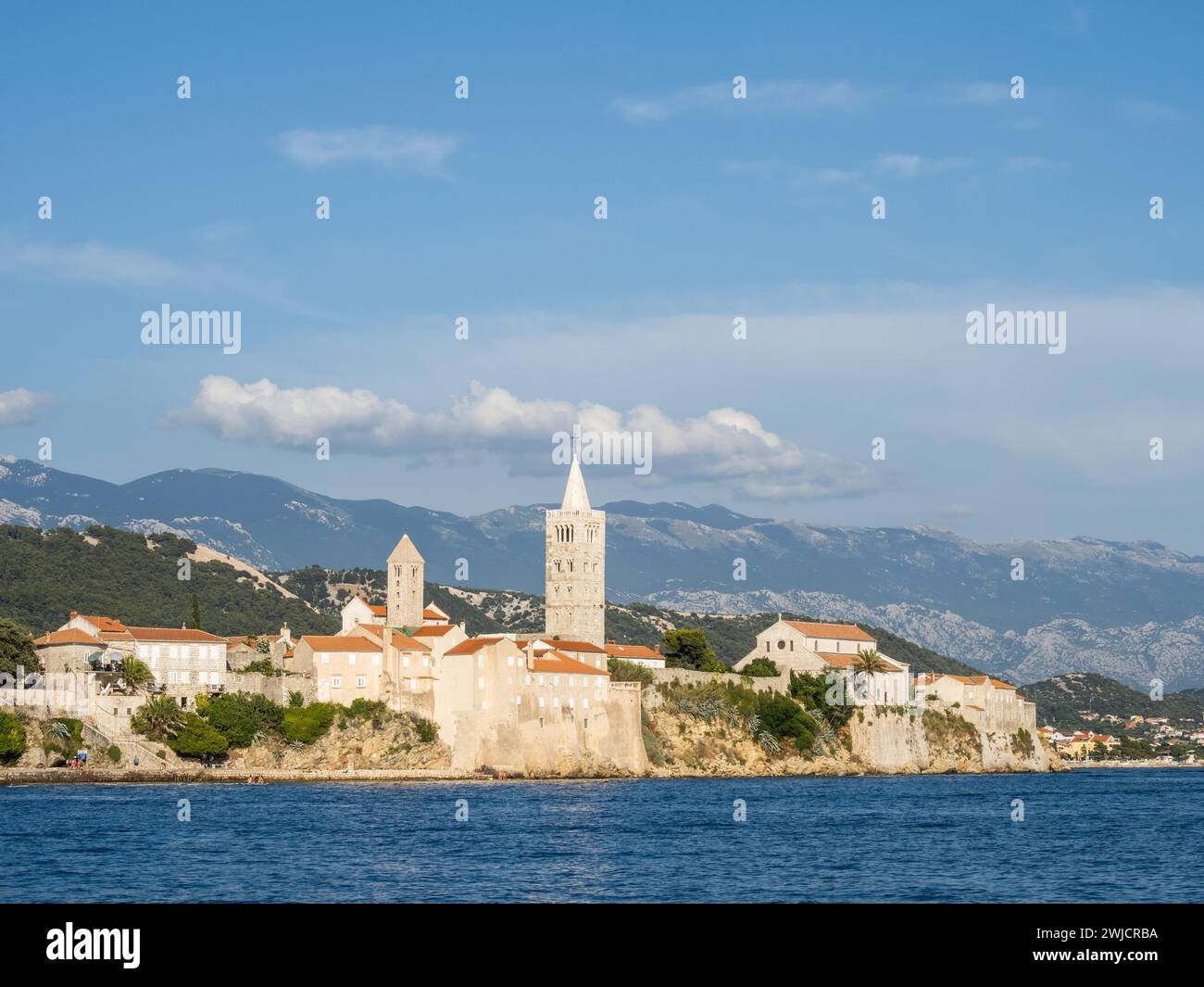 Church towers in the old town centre of Rab, seen from the sea, Rab ...