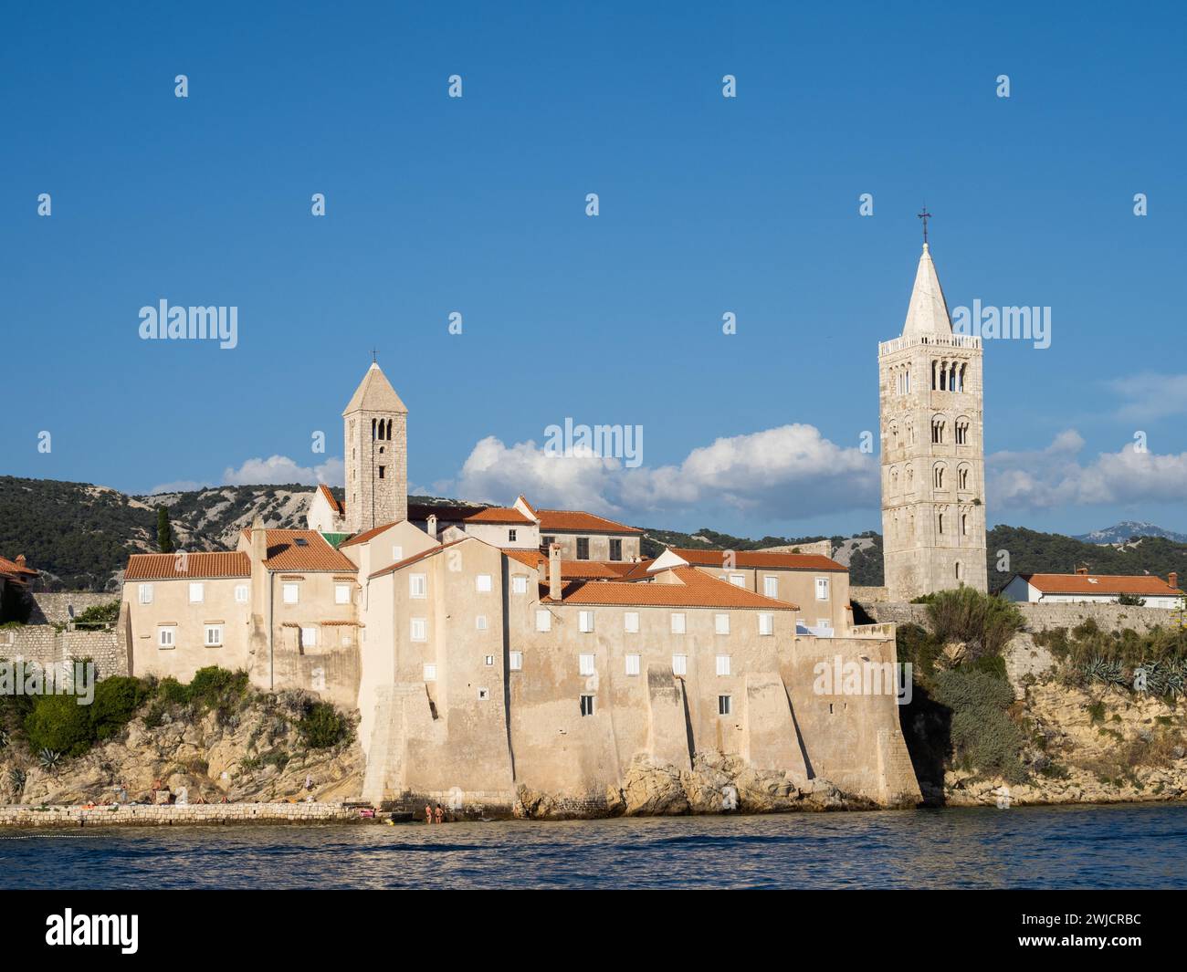 Church towers in the old town centre of Rab, seen from the sea, Rab ...