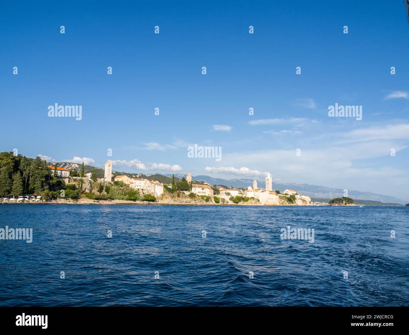 Church towers in the old town centre of Rab, seen from the sea, Rab ...