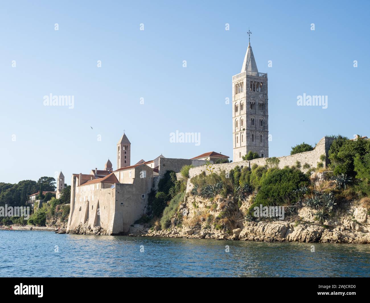 Church towers in the old town centre of Rab, seen from the sea, Rab ...
