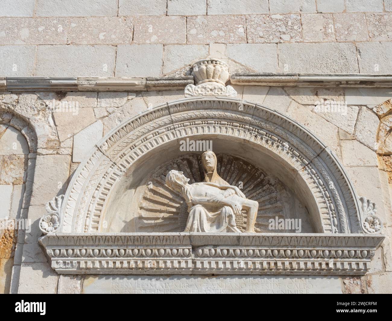 Stone sculpture, Mary holding the dead Jesus, detail on the former ...