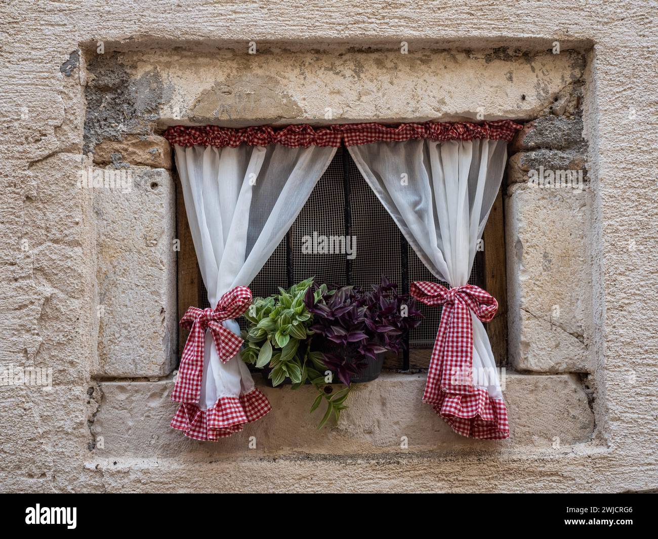 Window with floral decorations, old town centre of Rab, island of Rab ...