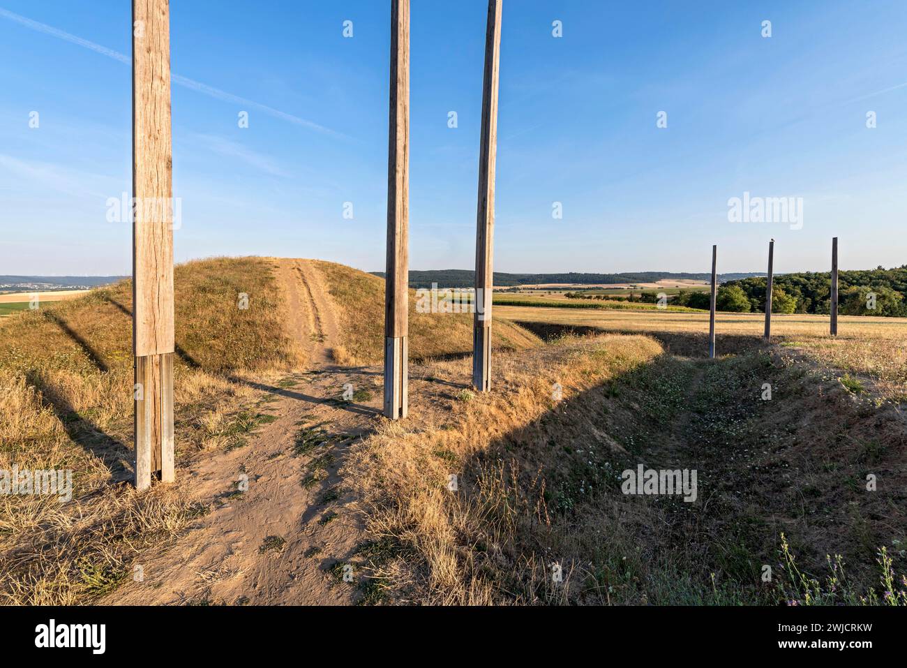 Burial site, reconstructed burial mound with oak posts, ditches and ...