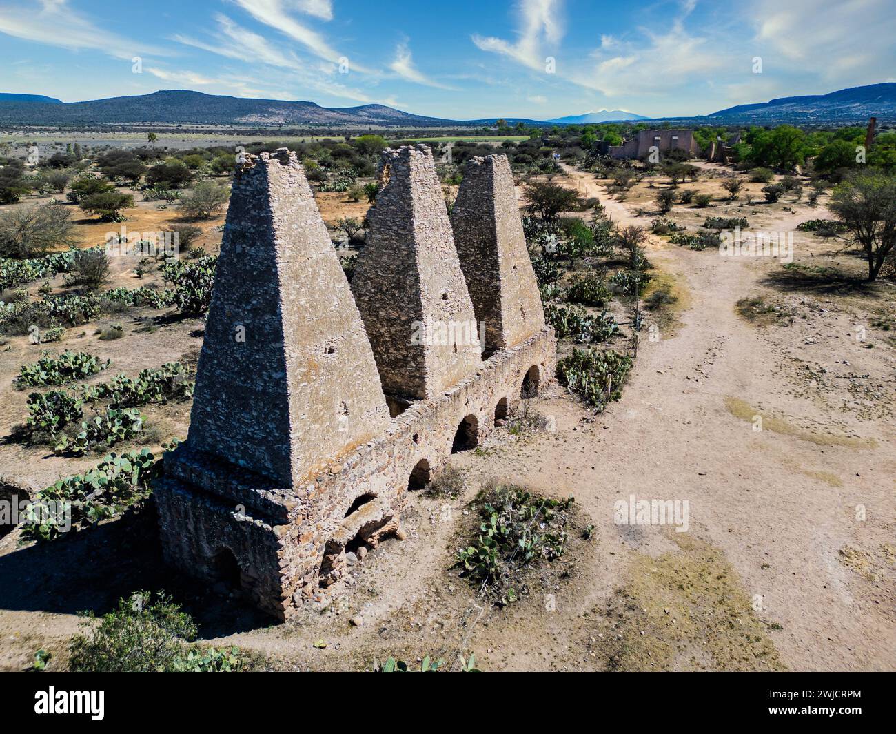 Aerial view of ancient Jesuit mining furnaces against a backdrop of the ...
