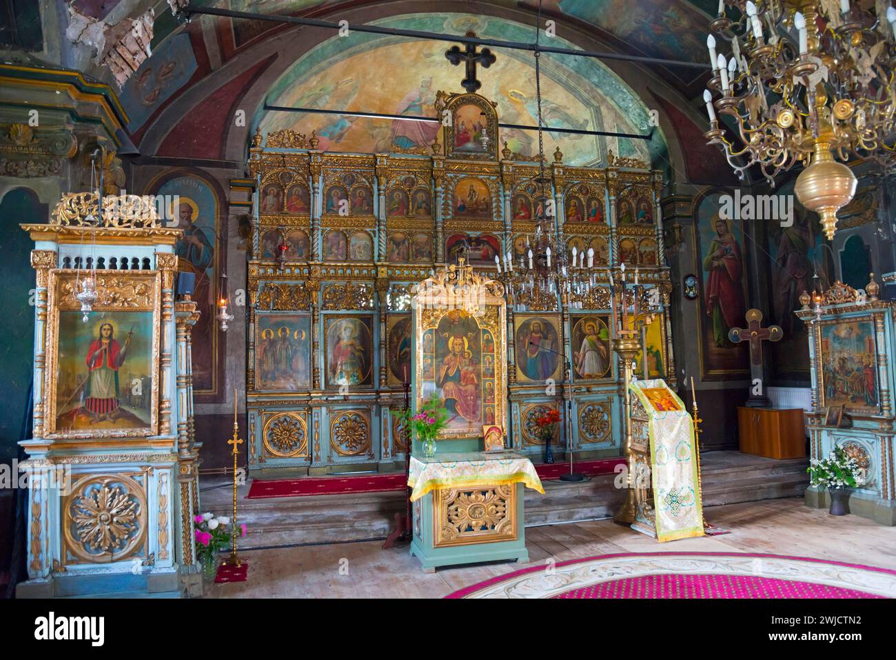 Interior view of a church with richly decorated iconostasis and religious ornaments, Suzana ...