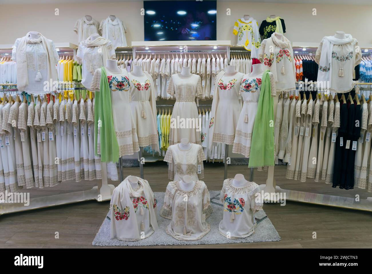 Boutique with elegant white garments, traditional costumes, Sibiu ...