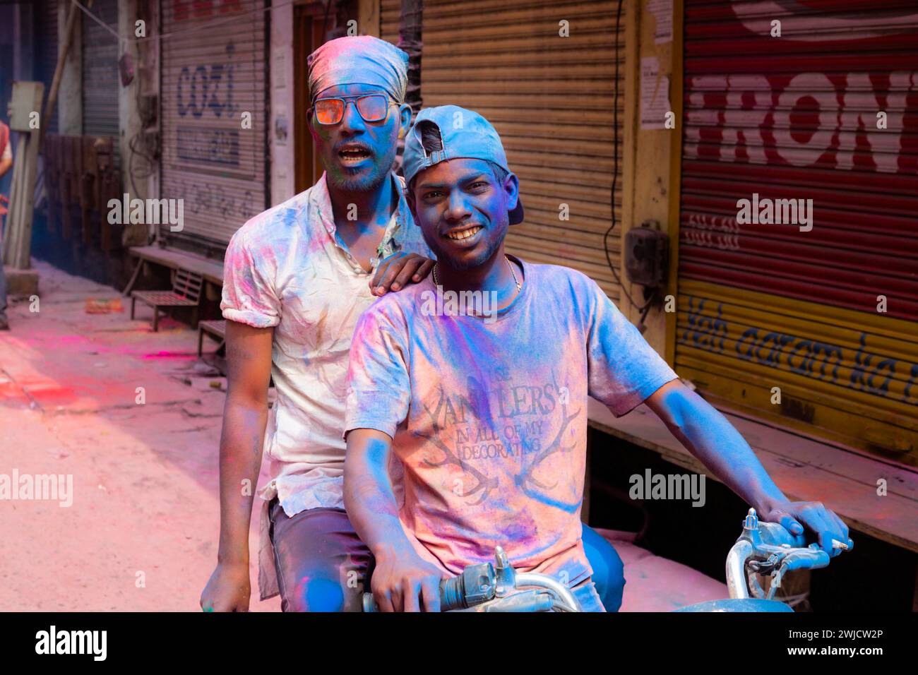Holi Festival of Colors in the streets of Mathura, India Stock Photo ...