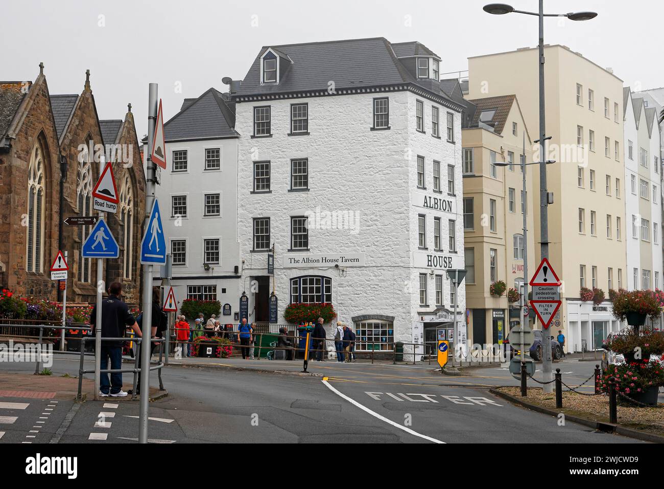 Town view of St. Peter Port with historic pub Albion House Tavern, St ...