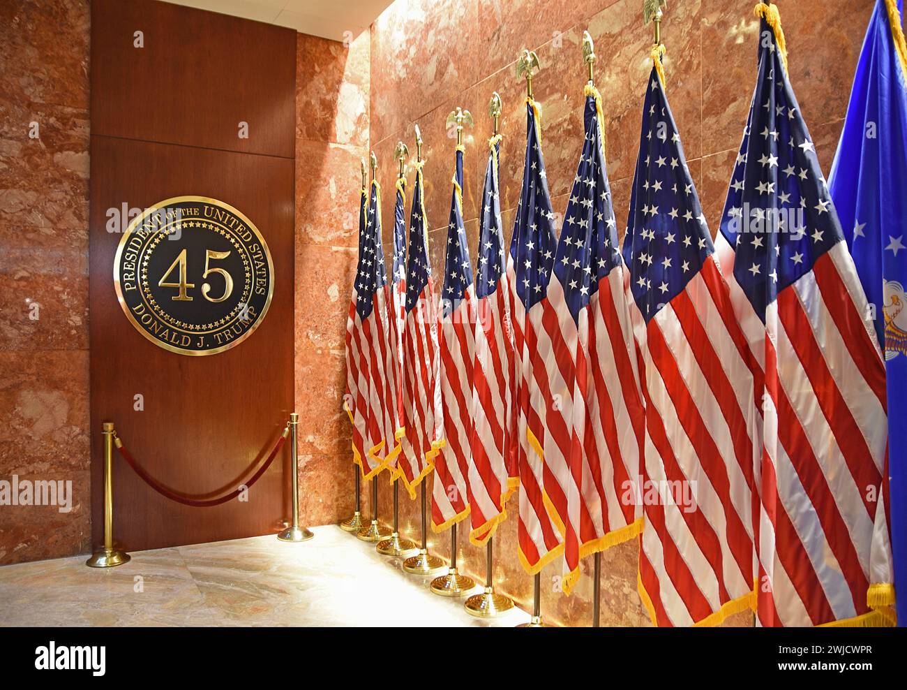 Flags of the USA and metal plaque with engraving Donald J. Trump 45th ...