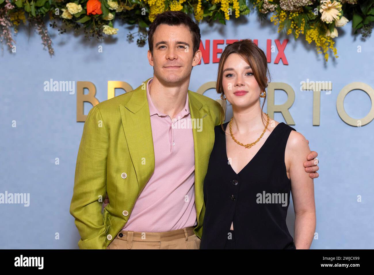 Luke Thompson, left, and Claudia Jessie pose for photographers upon ...