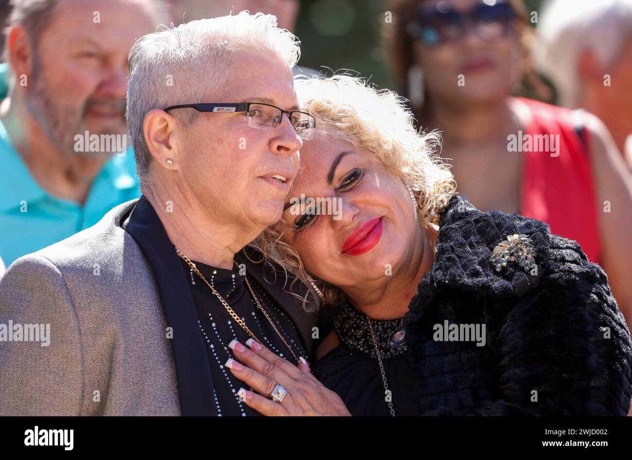 Nancy Jimenez, left, and Annette Jimenez, of St. Petersburg, Fla., renew their vows after being ...