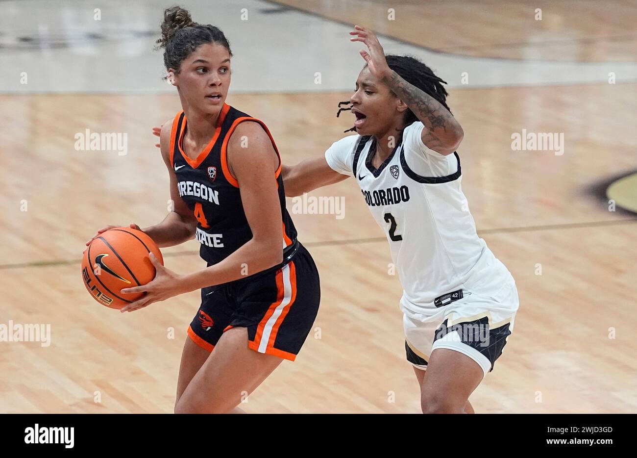 Oregon State guard Donovyn Hunter (4) and Colorado guard Tameiya Sadler ...