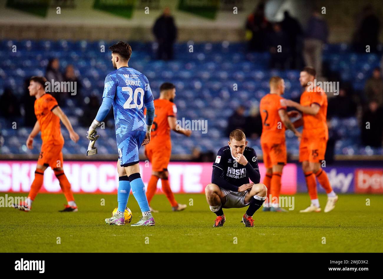 Millwall's George Saville appears dejected after the final whistle of ...