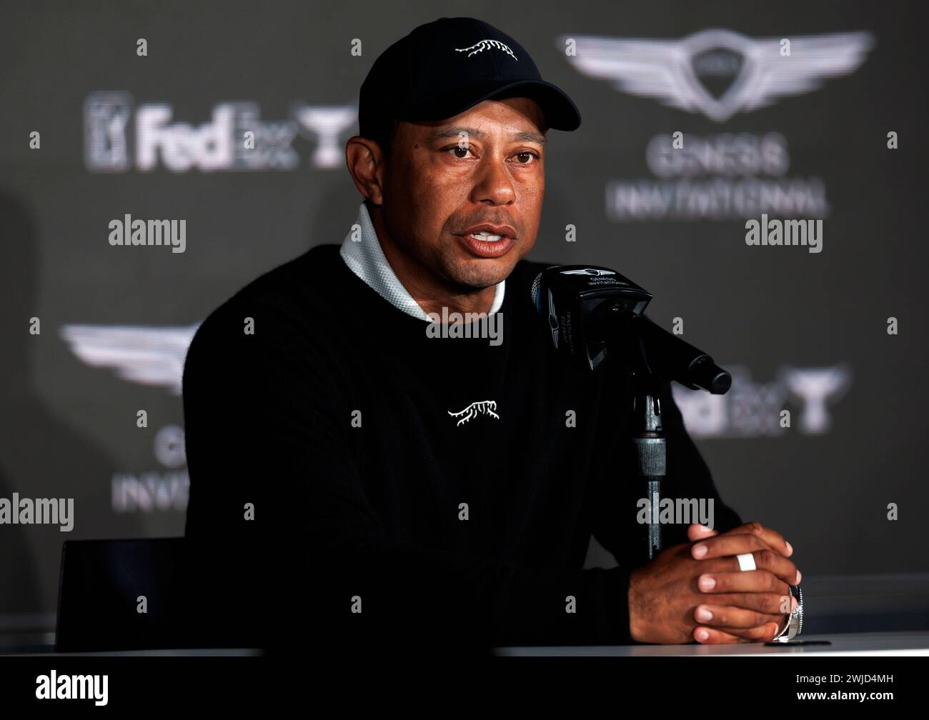 Tiger Woods speaks during a news conference at Riviera Country Club ...