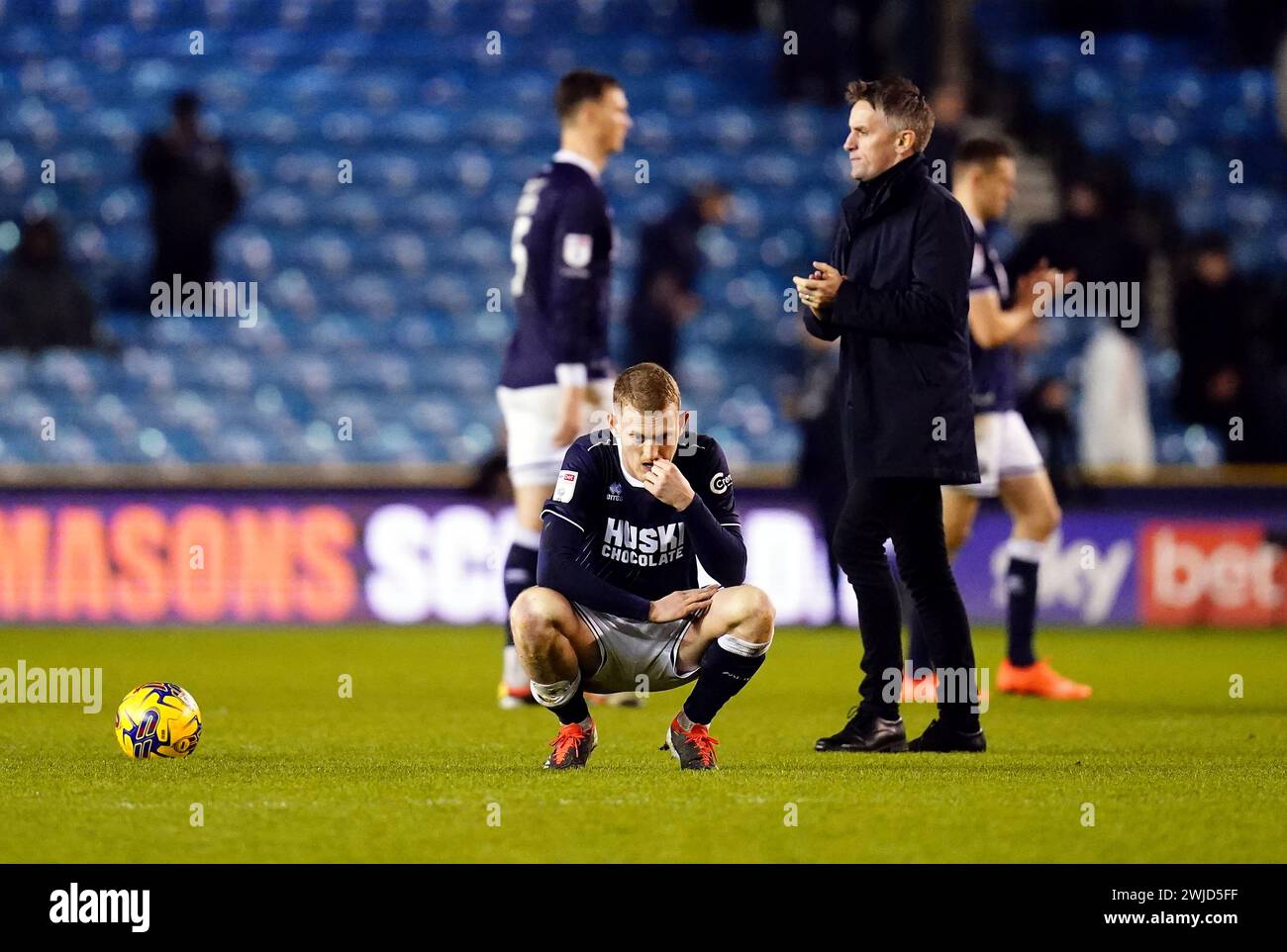 Millwall's George Saville appears dejected after the final whistle of ...