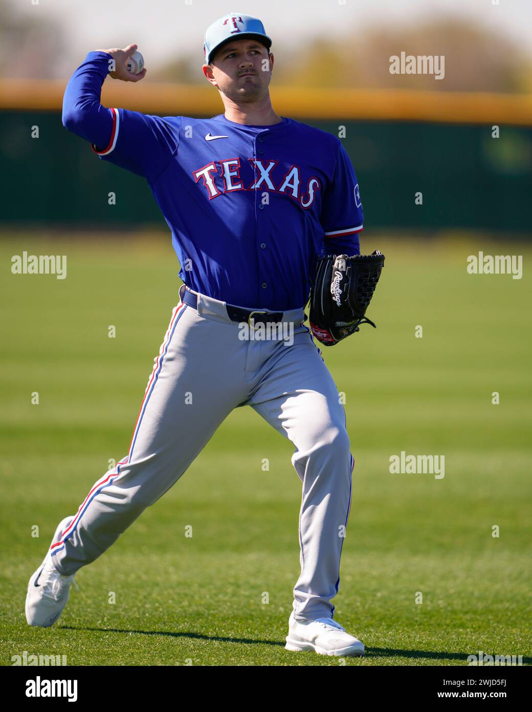 Texas Rangers starting pitcher Cody Bradford throws to a teammate to ...