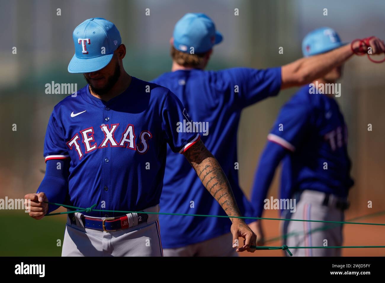 Texas Rangers relief pitcher Jonathan Hernandez warms up during spring ...