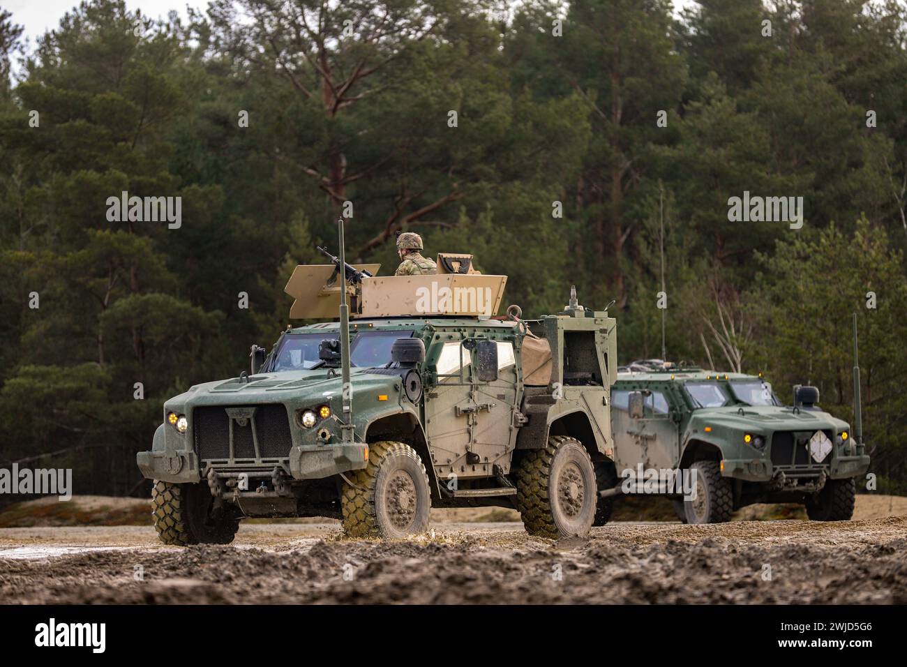 U.S. Army Soldiers assigned to the 3rd Infantry Division, drive off the ...